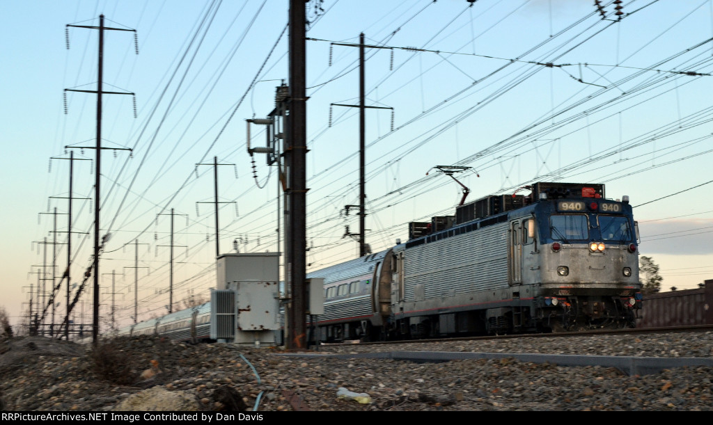 AEM-7 940 leads Regional 87 south through Morris